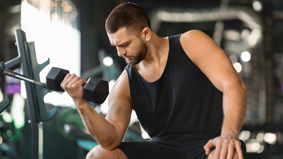 How To Properly Execute Seated Dumbbell Curls [Full Guide] – CrazyBulk ...